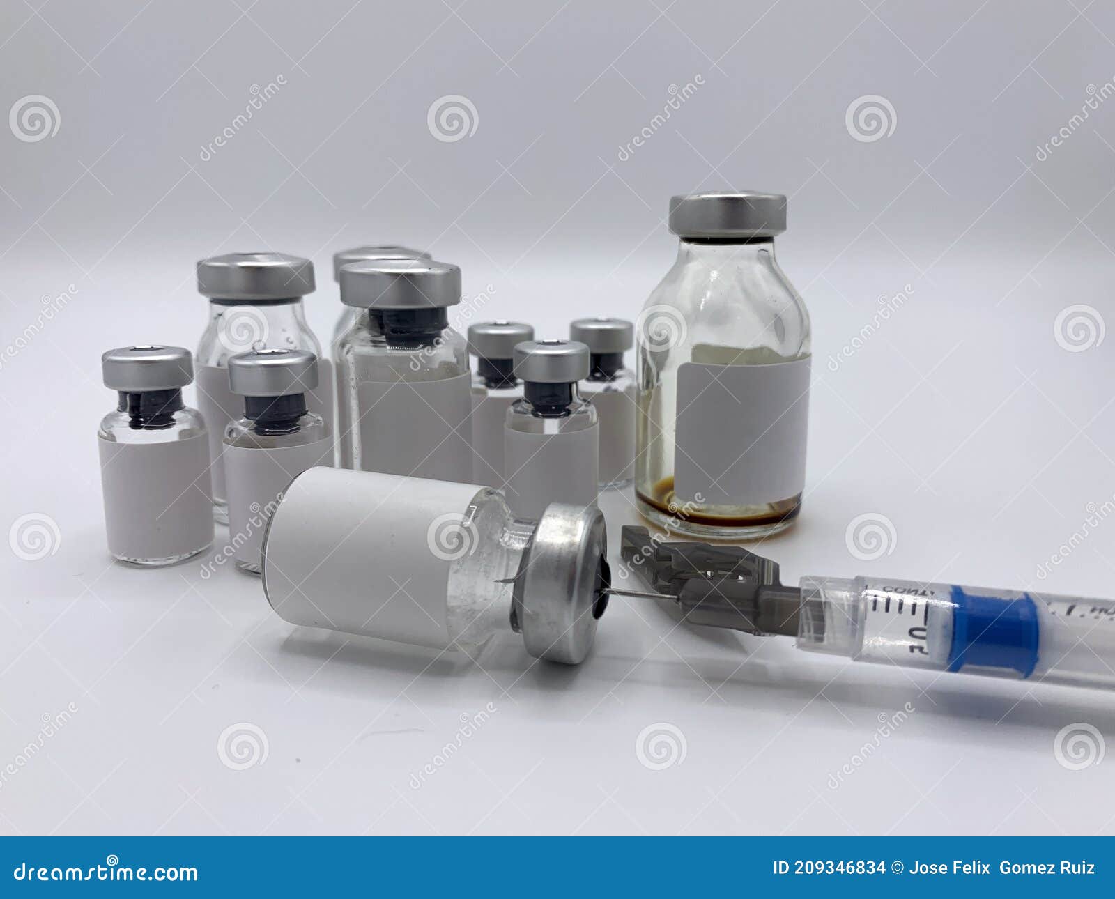 Syringe and vials stock photo. Image of corona, doctors - 209346834