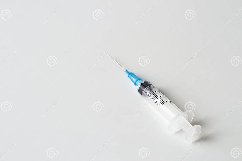 Syringe on white stock photo. Image of medicine, copy - 336385010
