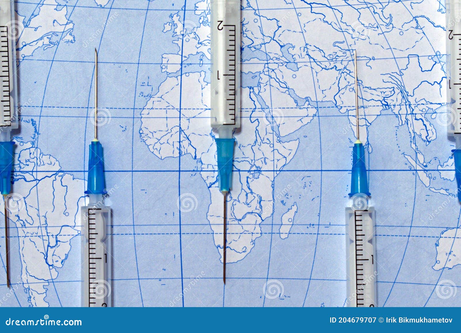Syringes On Background Of World Map Royalty-Free Stock Photo ...