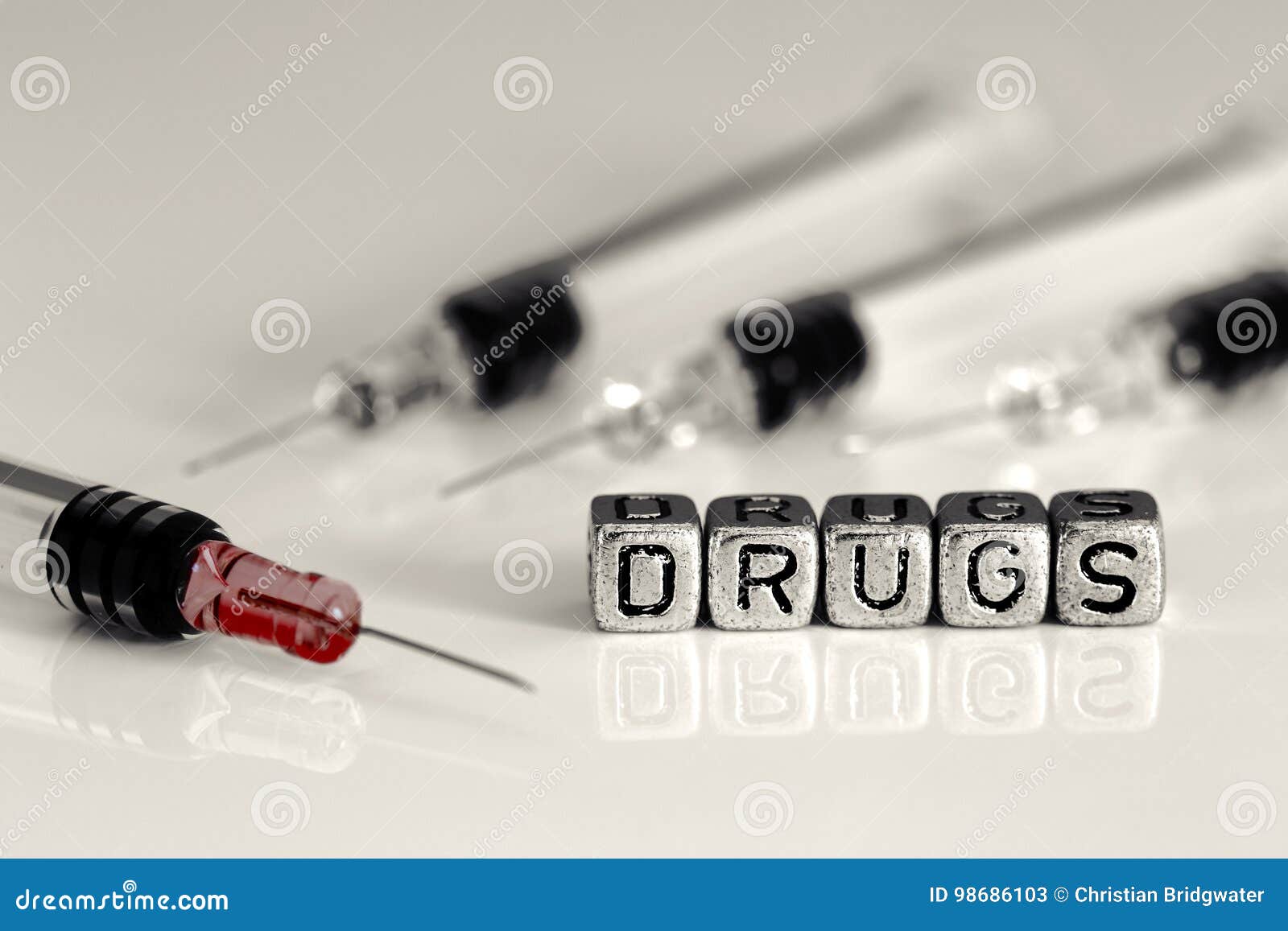 Syringes and Blood with the Word Drugs on Beads Stock Image - Image of ...