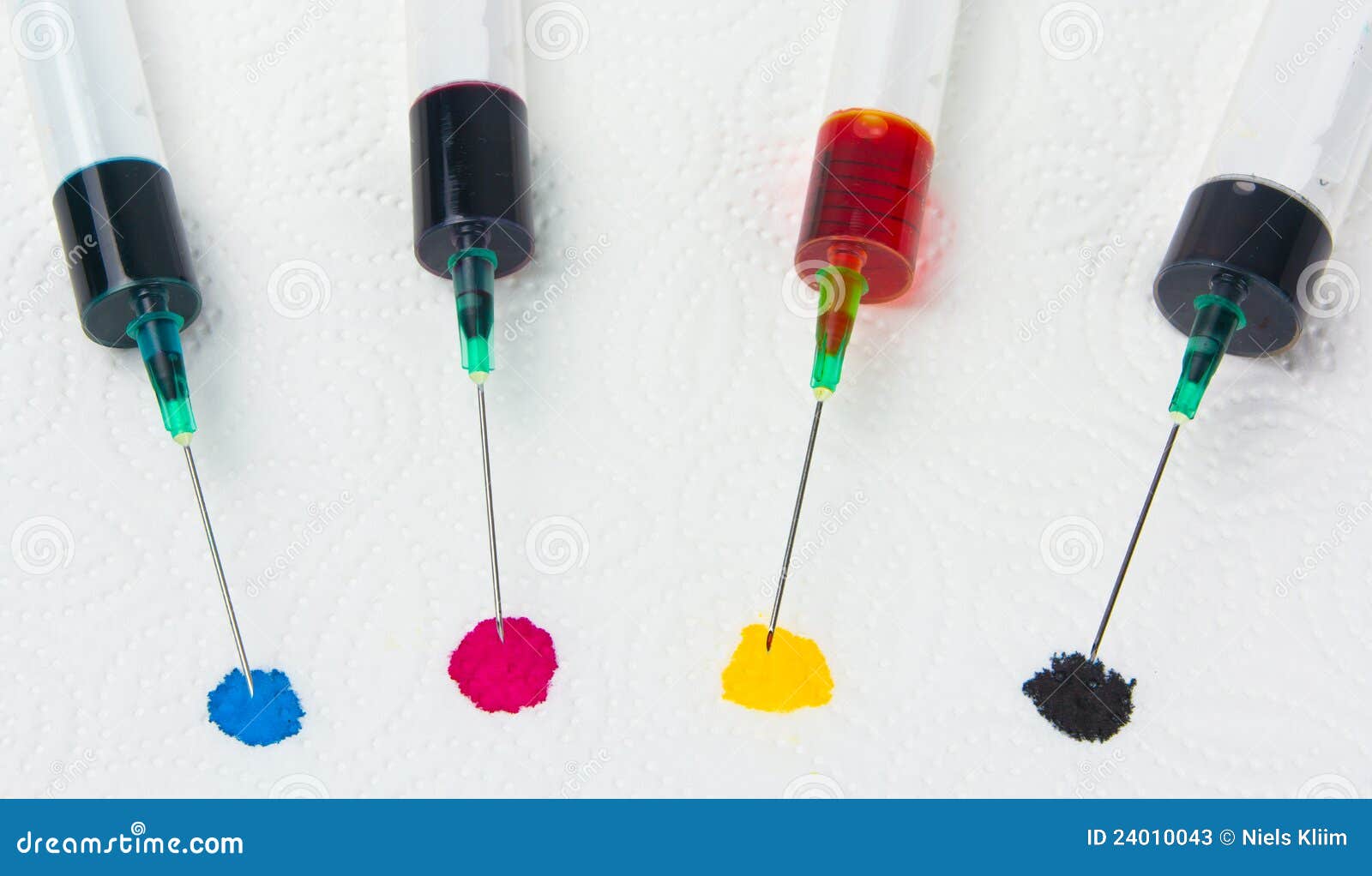 Syringes with CMYK colors stock image. Image of blue - 24010043