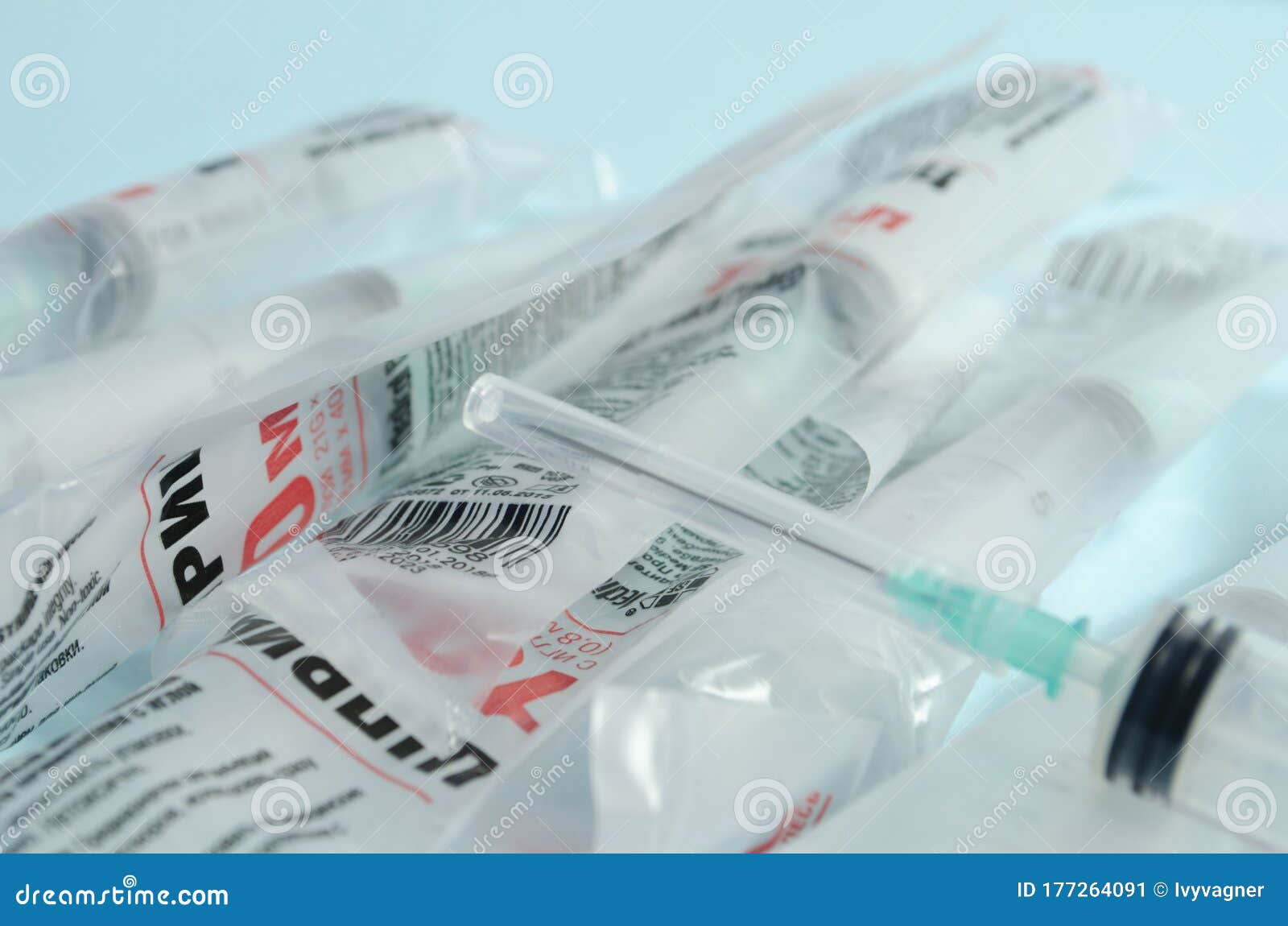 Close Up Of Syringe Hold By Hand With Injection Needle And Serum ...