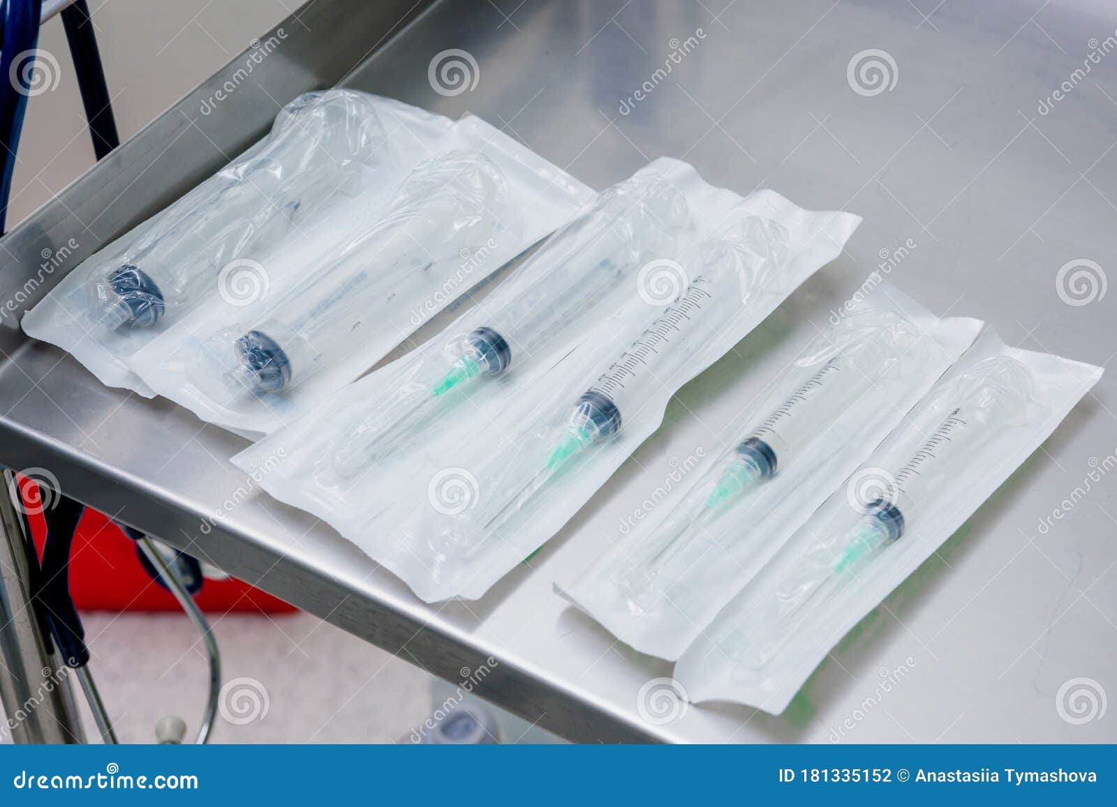 Syringes in Packaging on a Metal Table in the Operating Room Stock ...