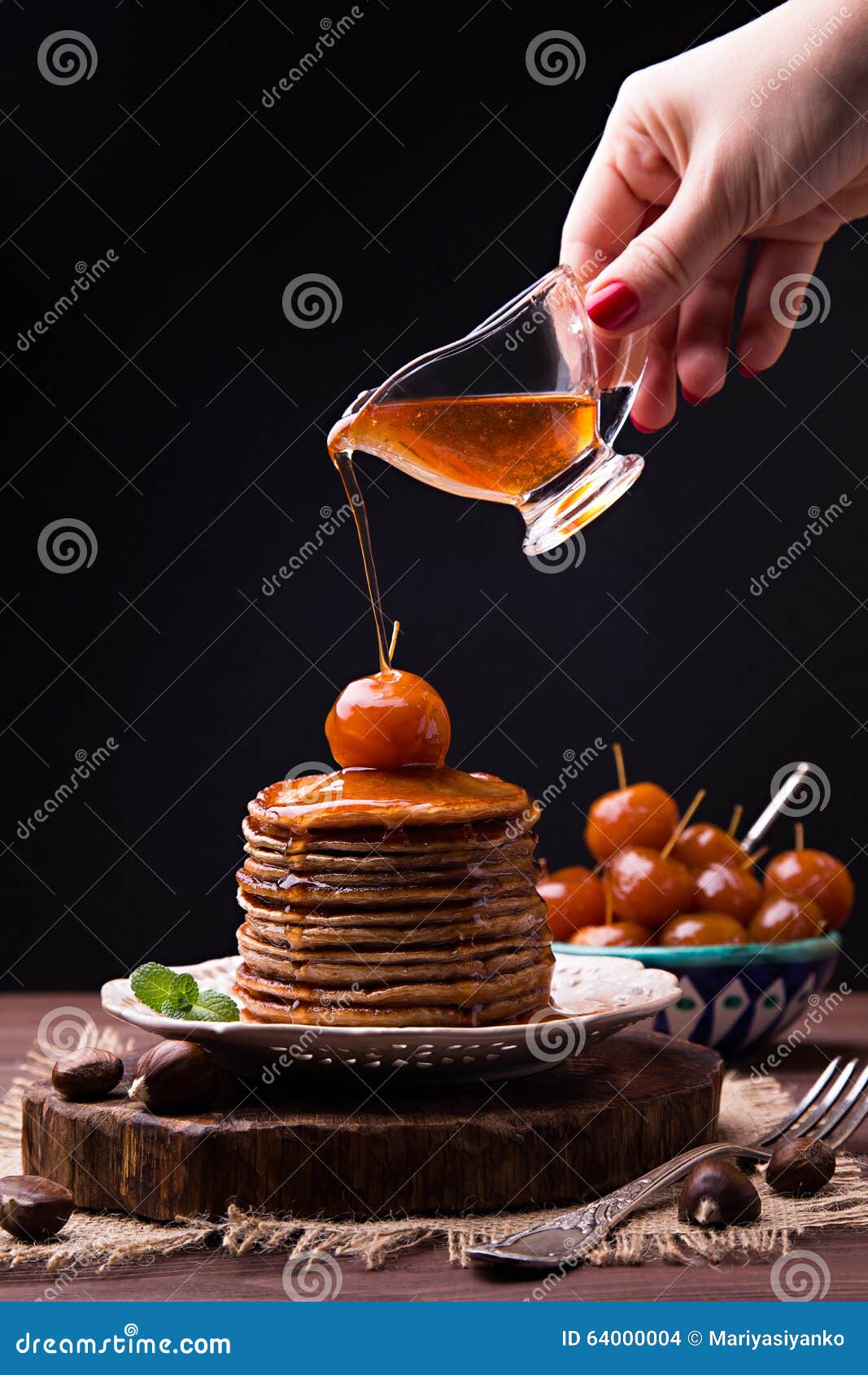 Syrup from Chinese Apples Jam Pouring on Stack of Chestnut Pancakes ...