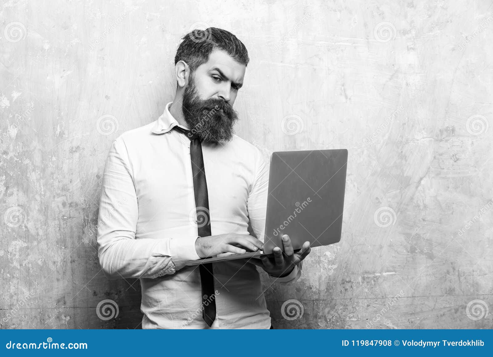 System Administrator. Bearded Man or Hipster with Long Beard Work on ...