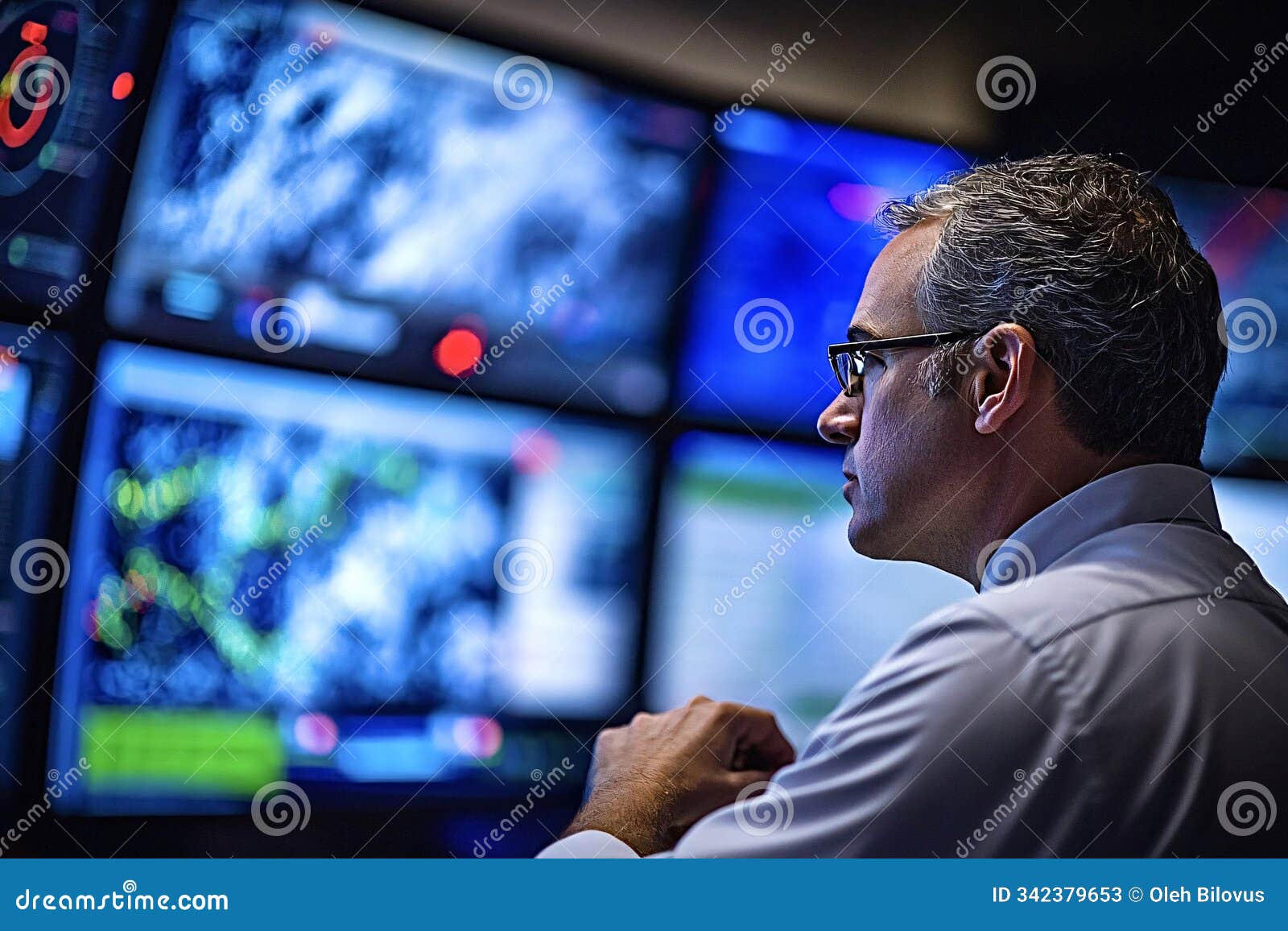 System Administrator Monitoring Network Activity on Multiple Computer ...