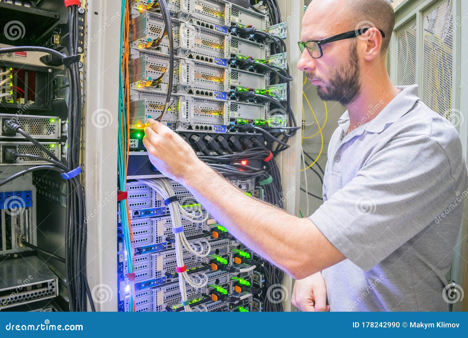 The System Administrator Works in the Data Center. Portrait of a ...