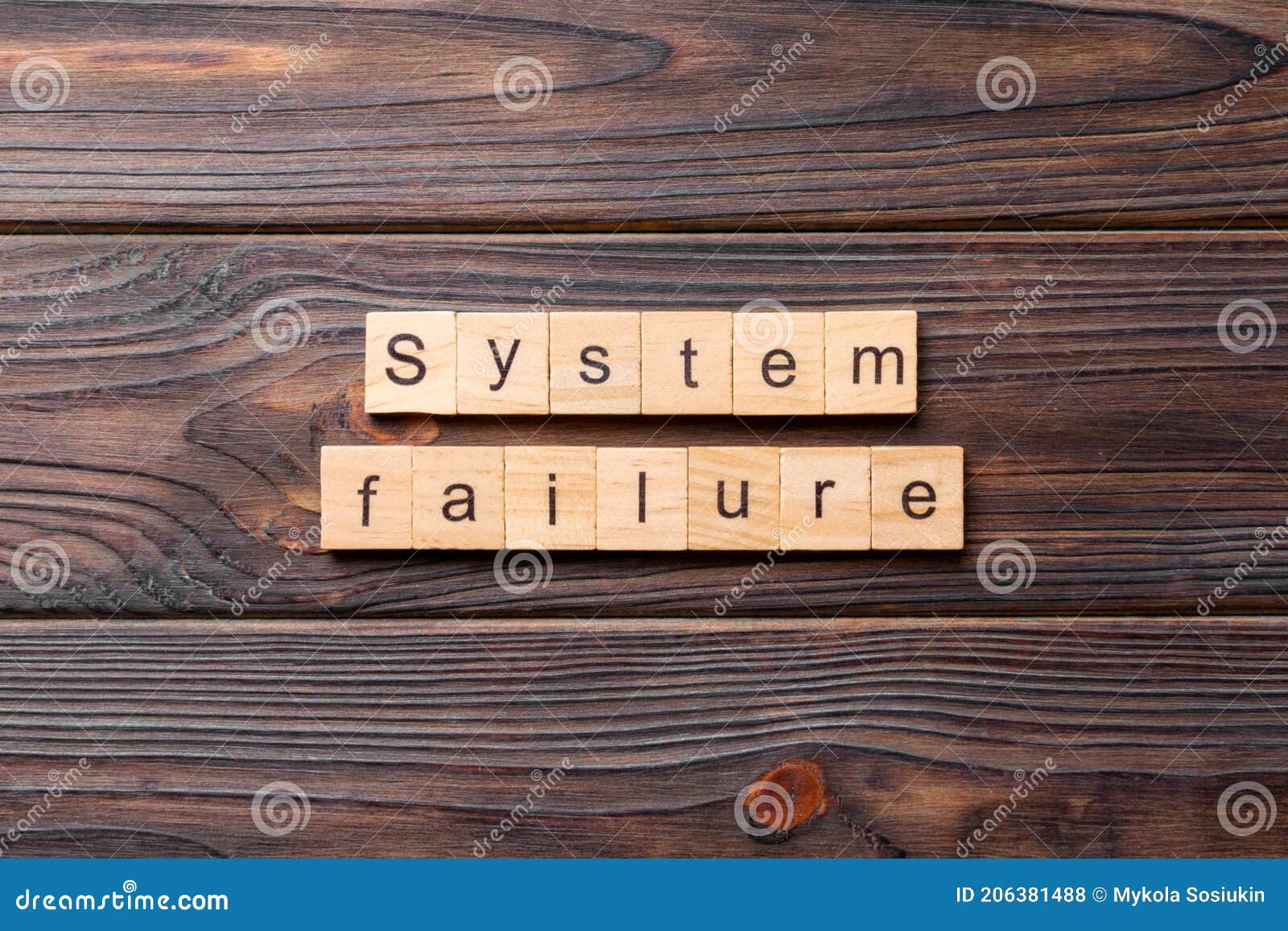 System Failure Word Written on Wood Block. System Failure Text on Table ...