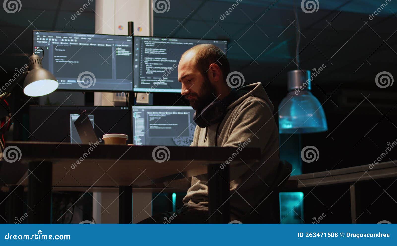 System Programmer Typing Source Code On Laptop And Multiple Monitors Stock Footage Video Of