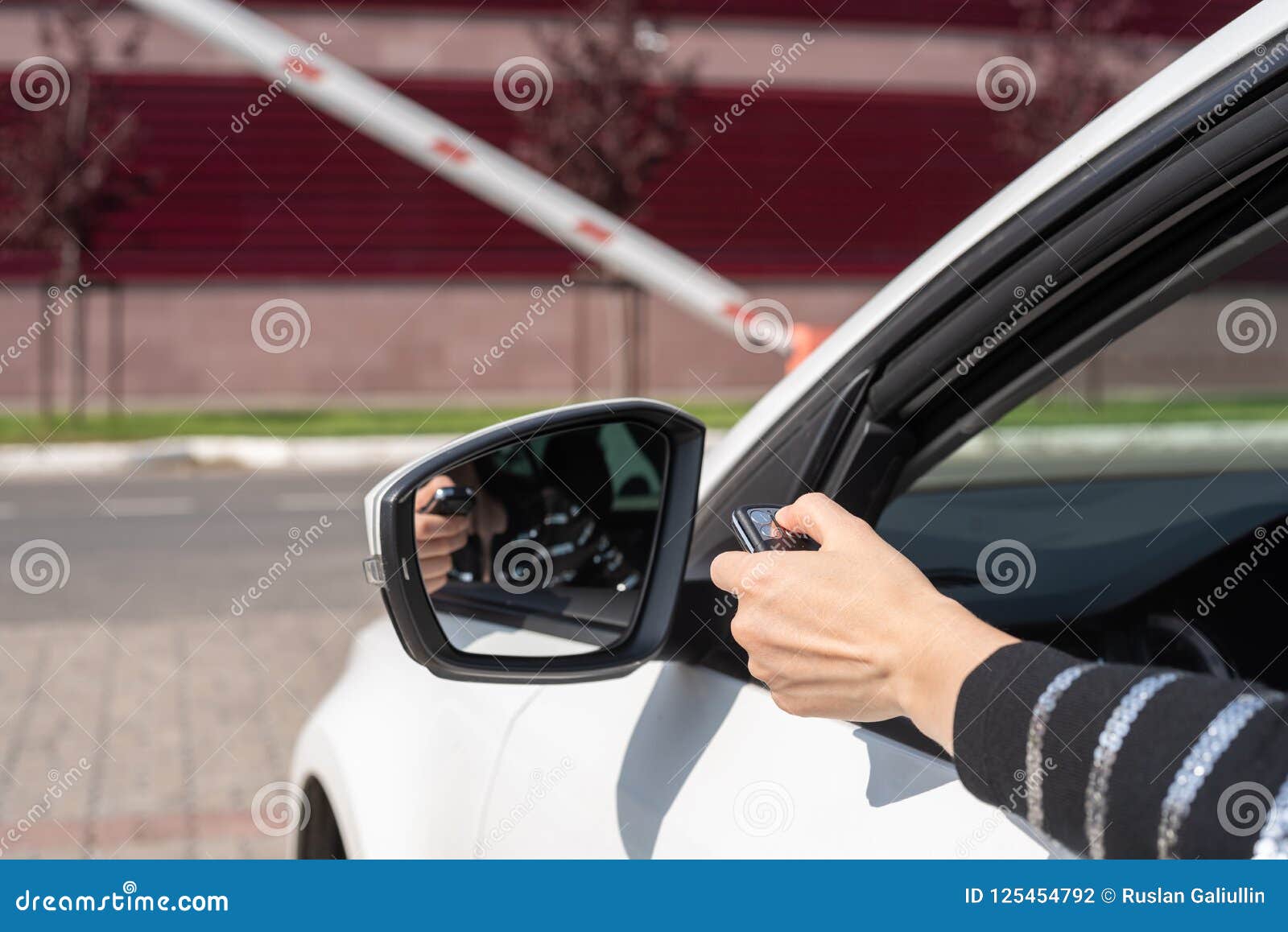 System of Remote Opening of a Barrier, Female Hand with the Panel Opens ...