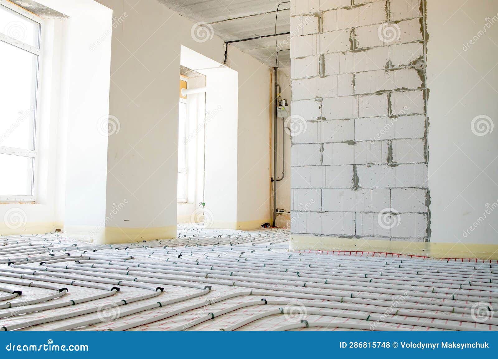 System of Underfloor Heating, Work in Progress on a Construction Site ...
