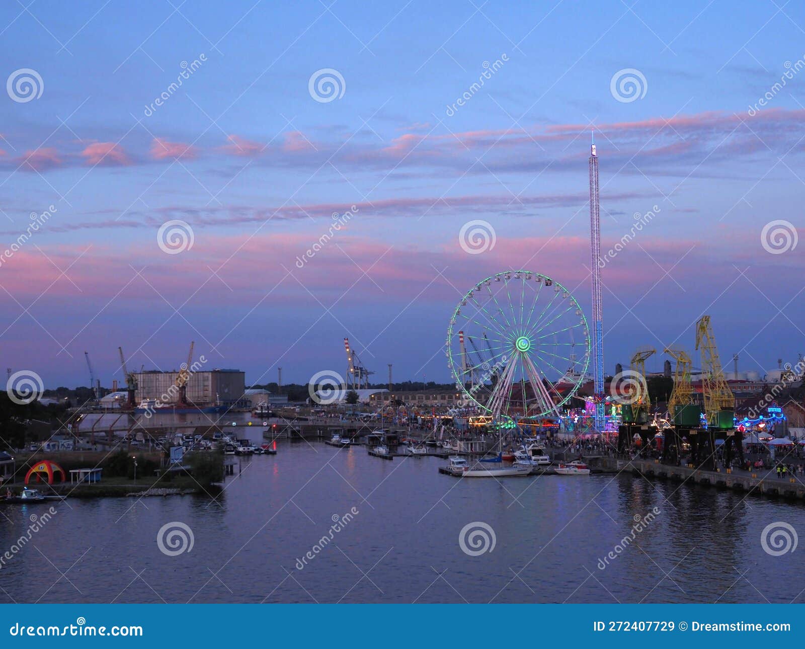 River and Theme Park Rides at Dusk - West Oder River Szcaecin Poland ...