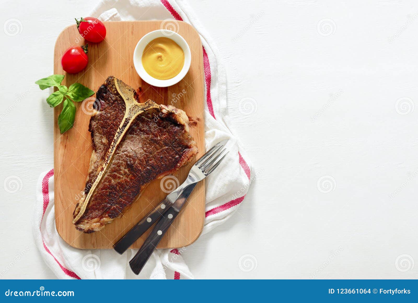 T-bone Beef Stake Served on a Cutting Board Stock Photo - Image of mock ...