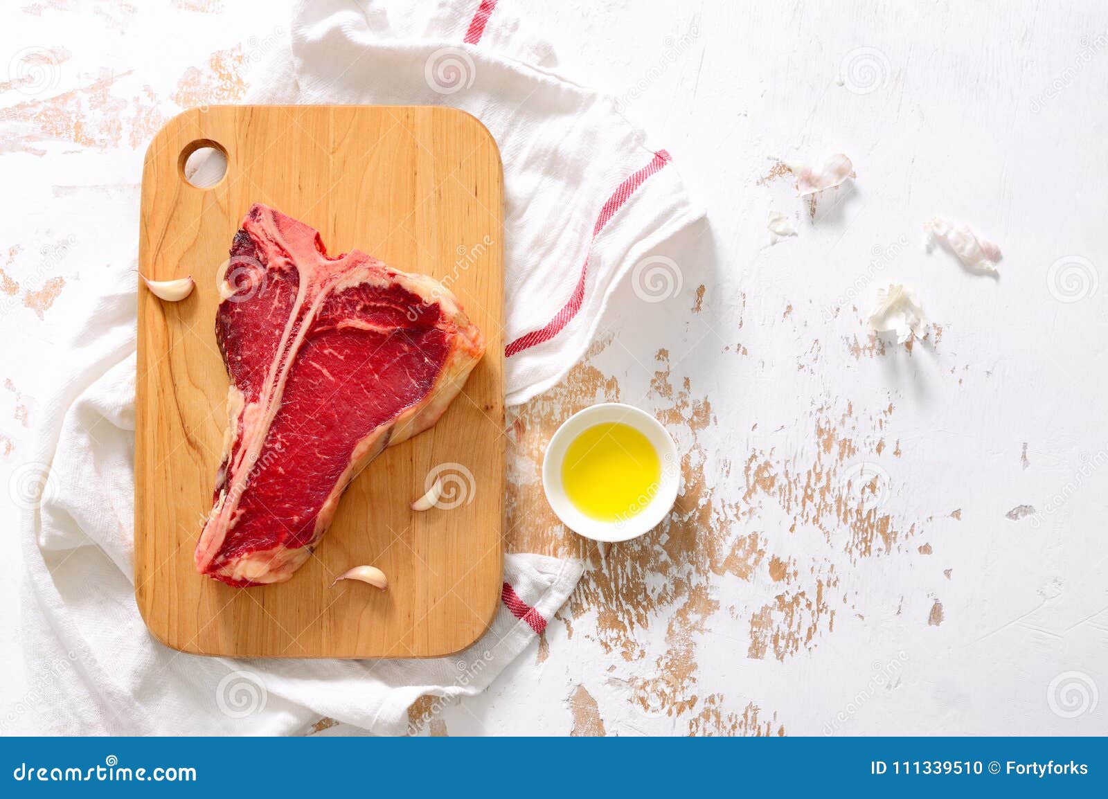 T-bone Raw Steak on a Kitchen Table Surface, View from Above Stock ...