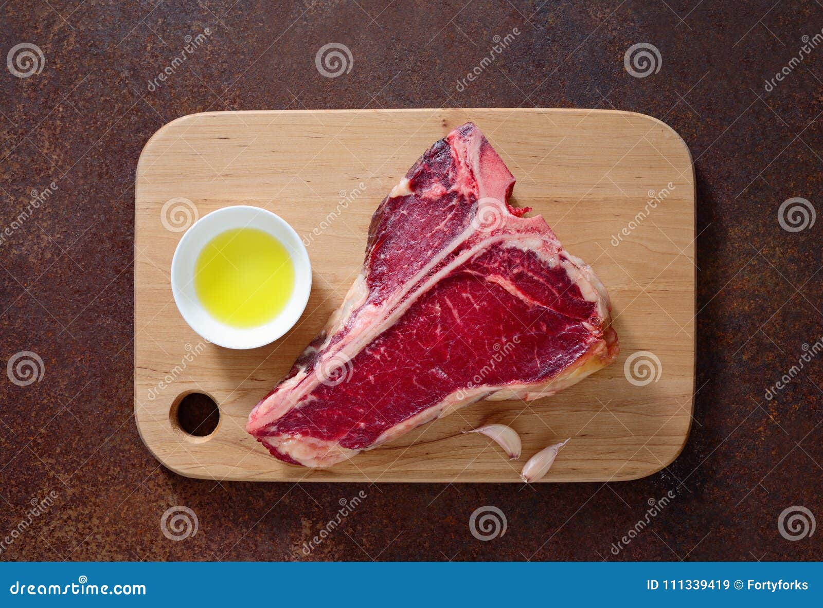 T-bone Raw Steak on a Kitchen Table Surface, View from Above Stock ...