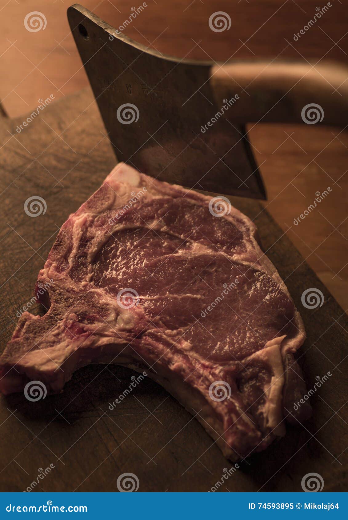 T-bone Roast Beef Steak with a Vintage Cleaver on a Cutting Boar Stock ...