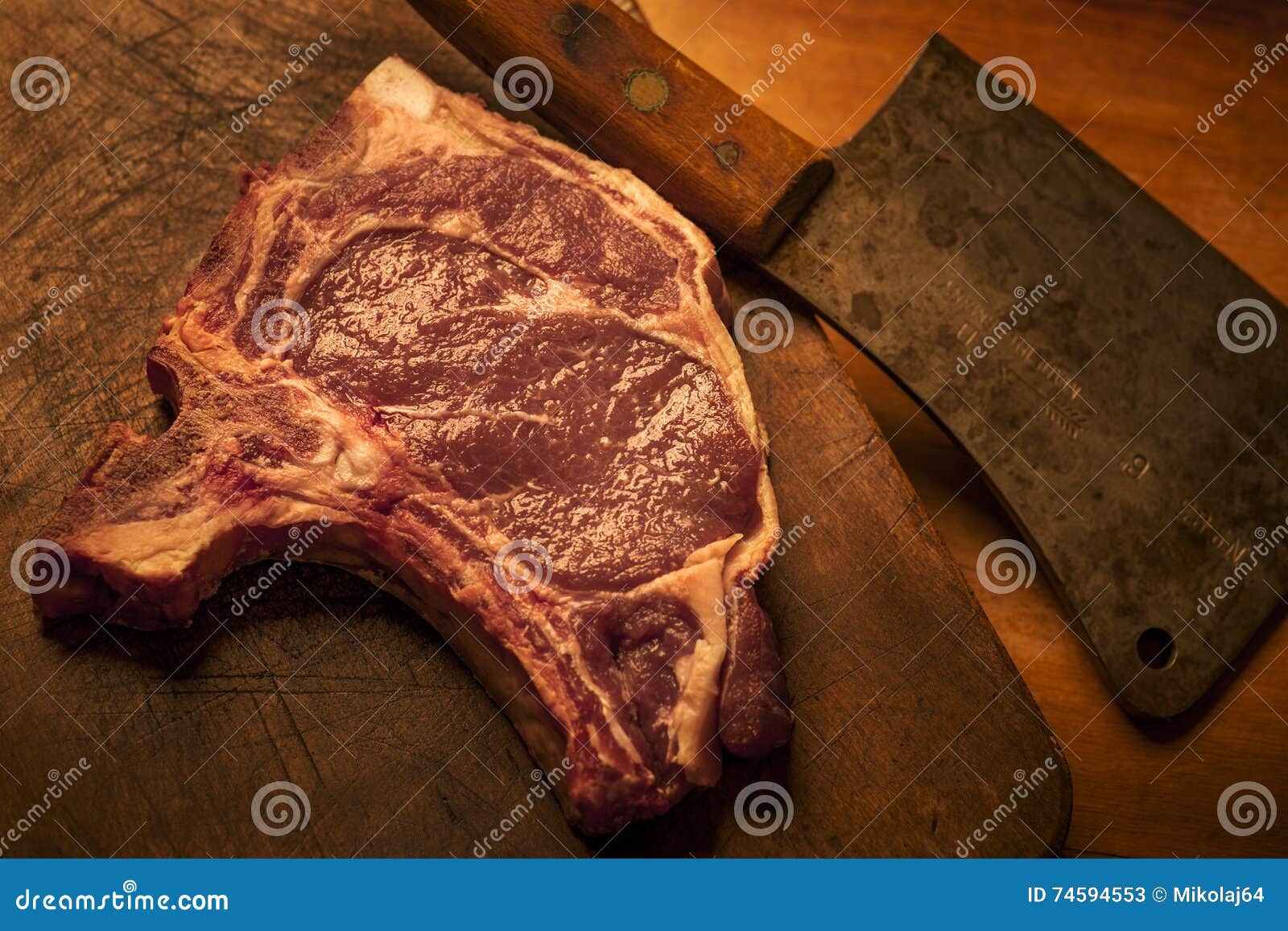 T-bone Roast Beef Steak with a Vintage Cleaver on a Cutting Boar Stock ...