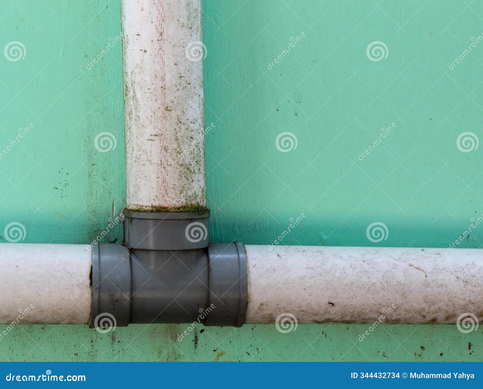 T connection on water pipe stock photo. Image of home - 344432734