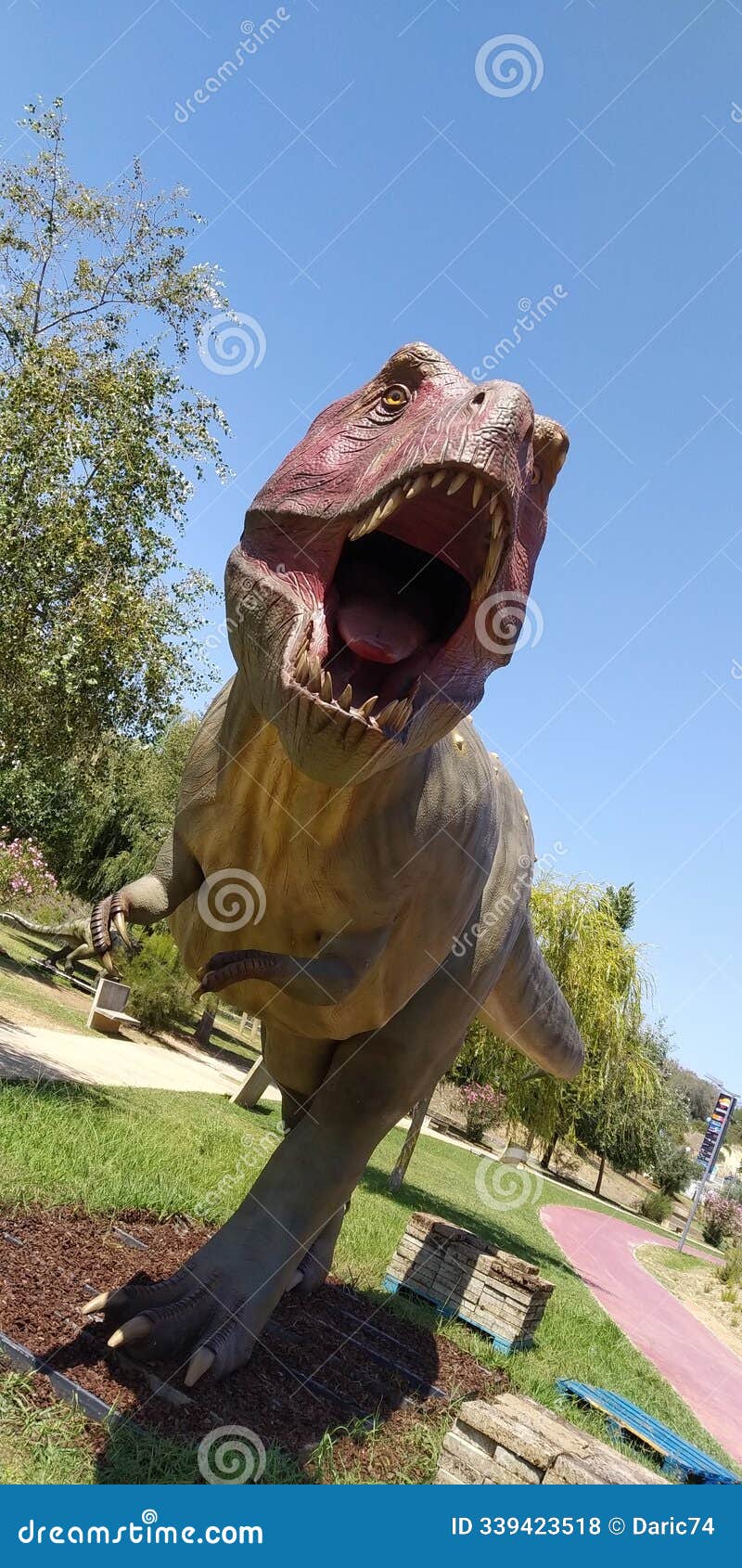 Statue Of Dinosaur Tyrannosaurus Stock Image | CartoonDealer.com #111991075