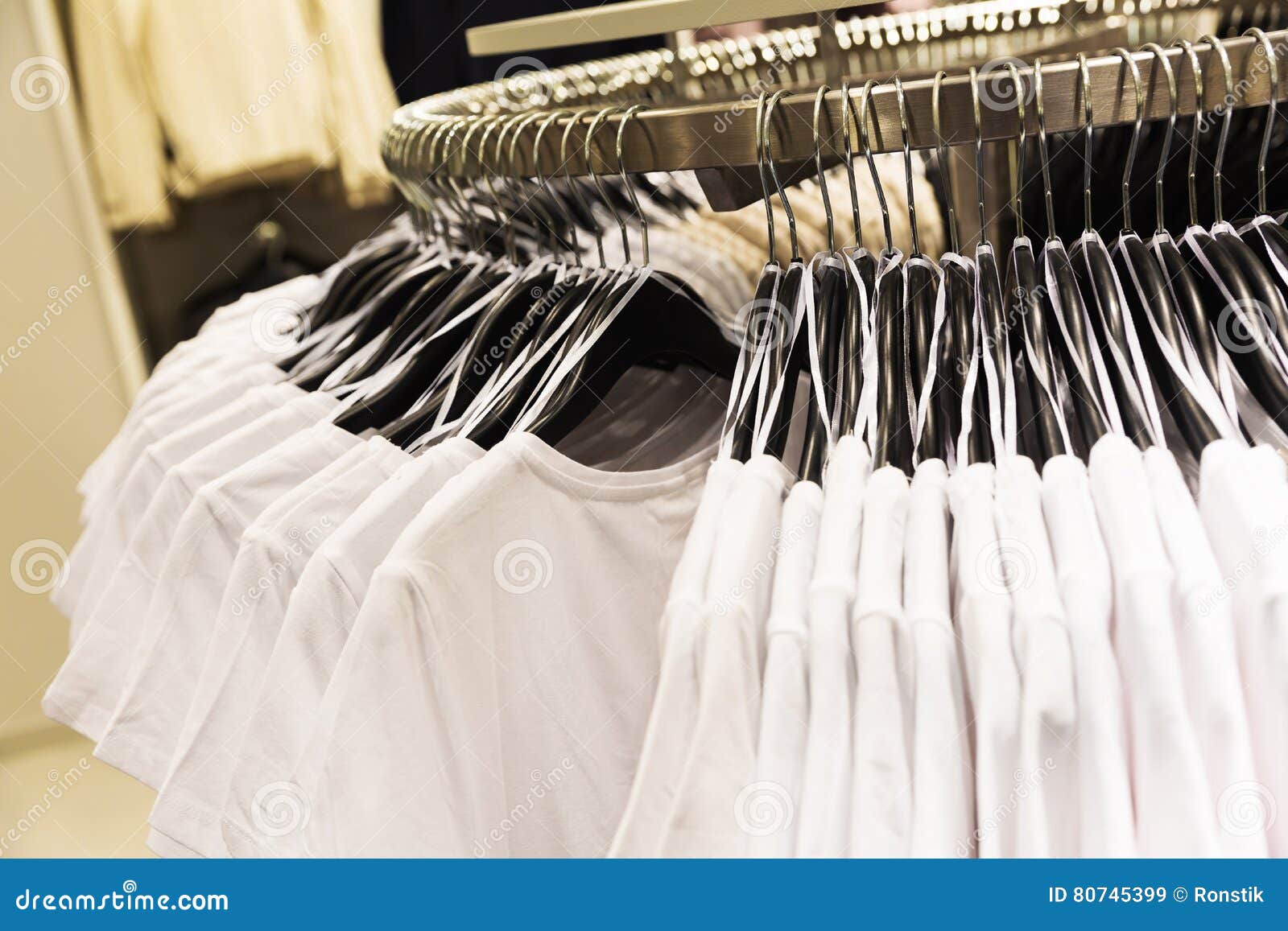 T-shirts Hanging on Rack in a Store Stock Image - Image of fashion ...