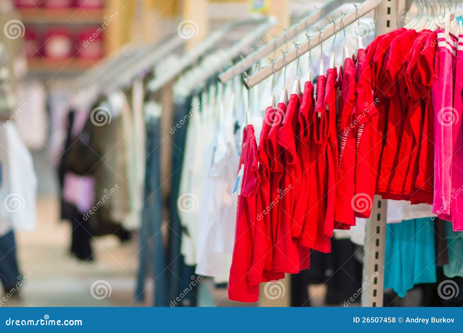 T-shirts on Stands in Kids Mall Stock Photo - Image of shirt, looking ...
