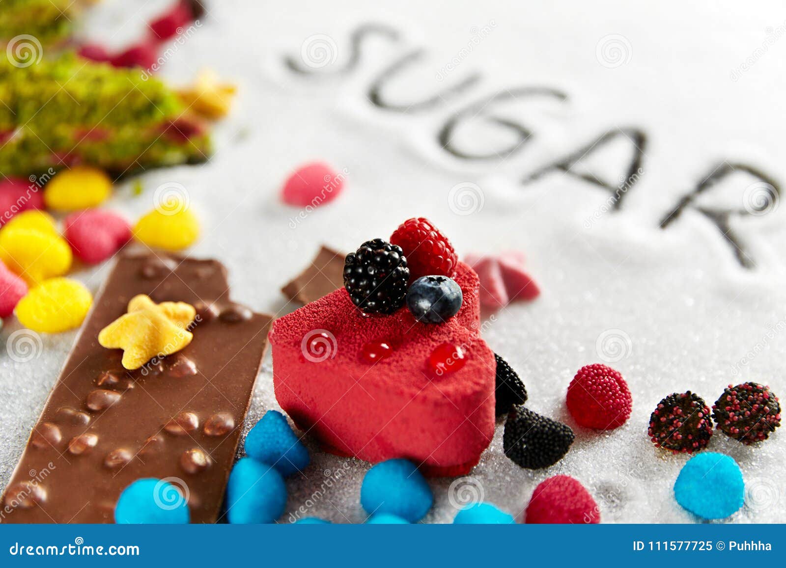 Tabla De Sugar and Colorful Sweets on Imagen de archivo - Imagen de ...