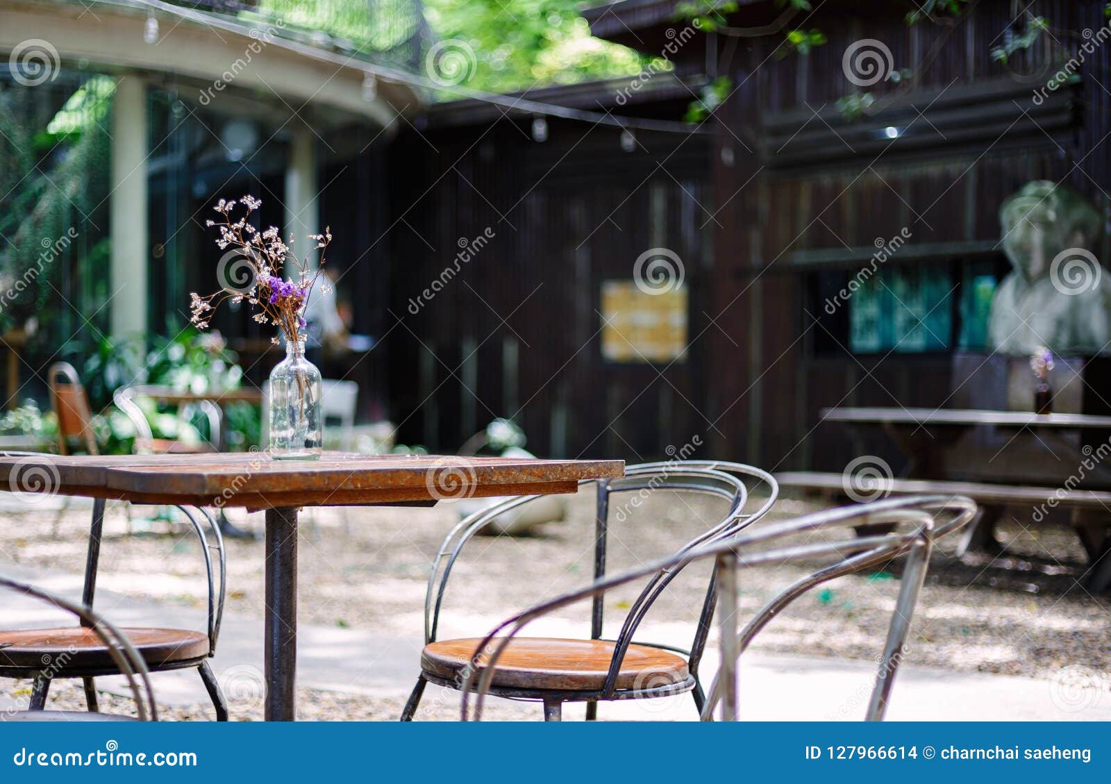 A Table and Chair are Outdoor in the Coffee Shop. Stock Photo - Image ...