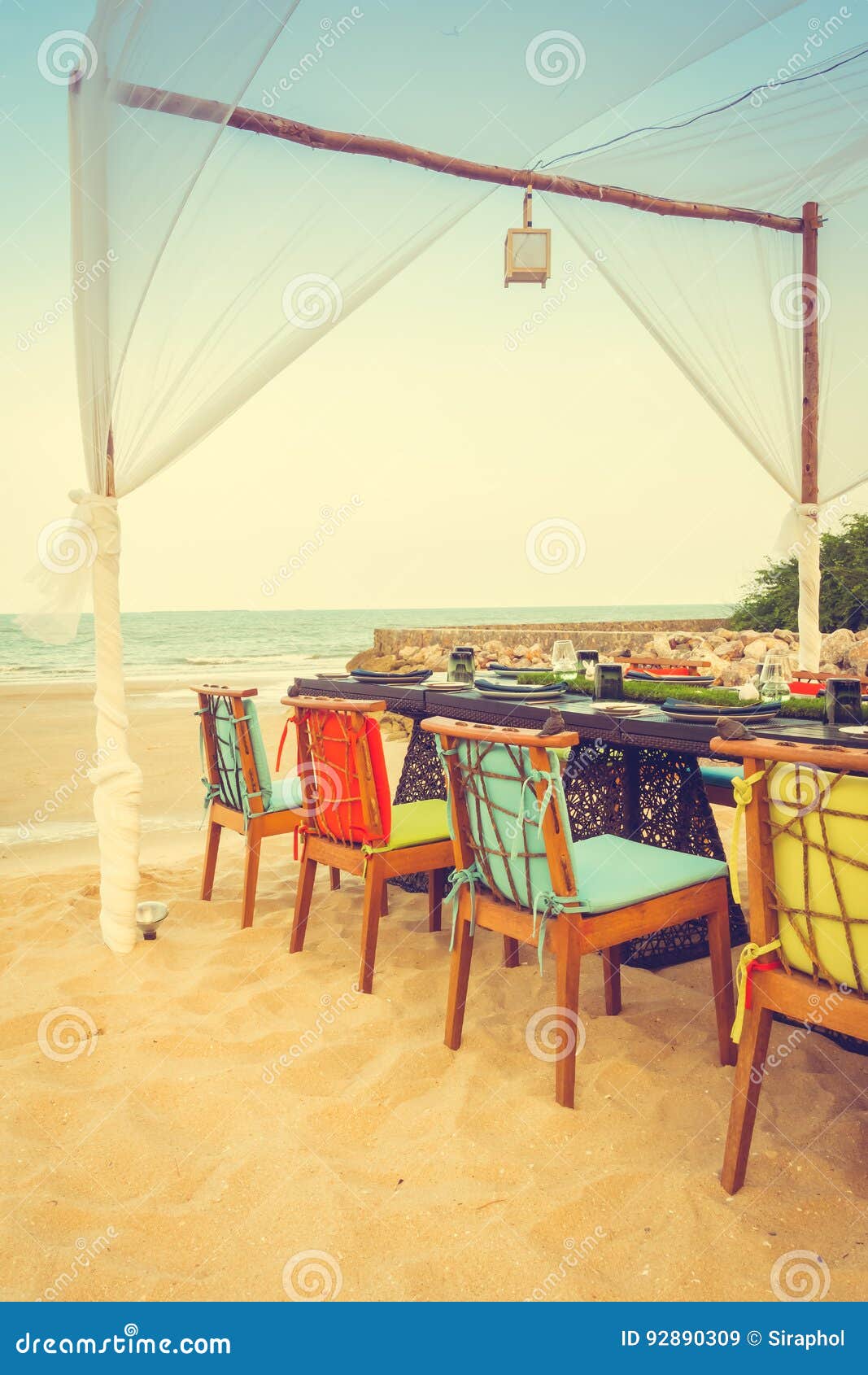 Table and Chair Set on the Beach for Dinner Stock Image - Image of ...