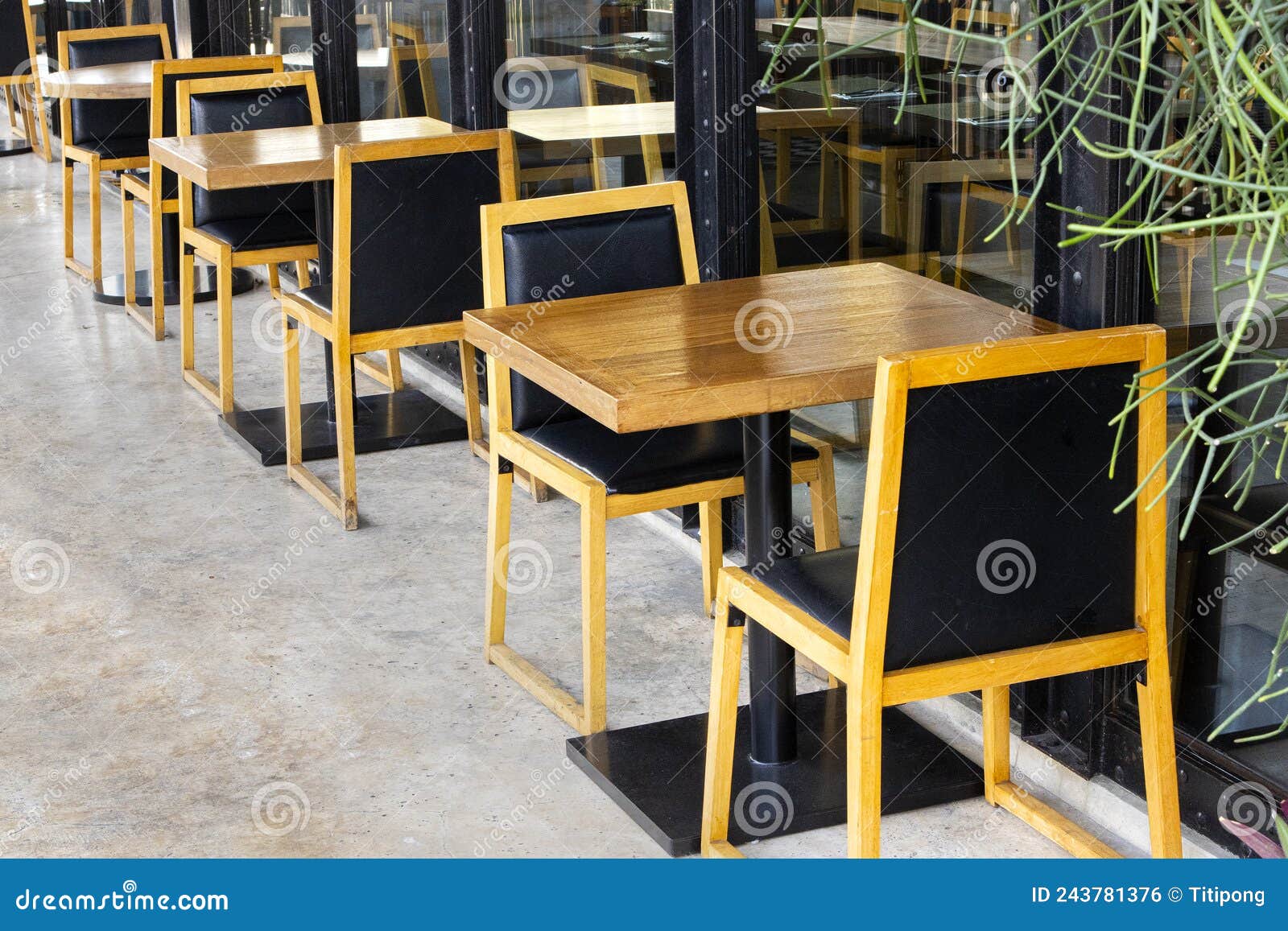 Table and Chairs in Front of the Restaurant; Stock Photo - Image of ...