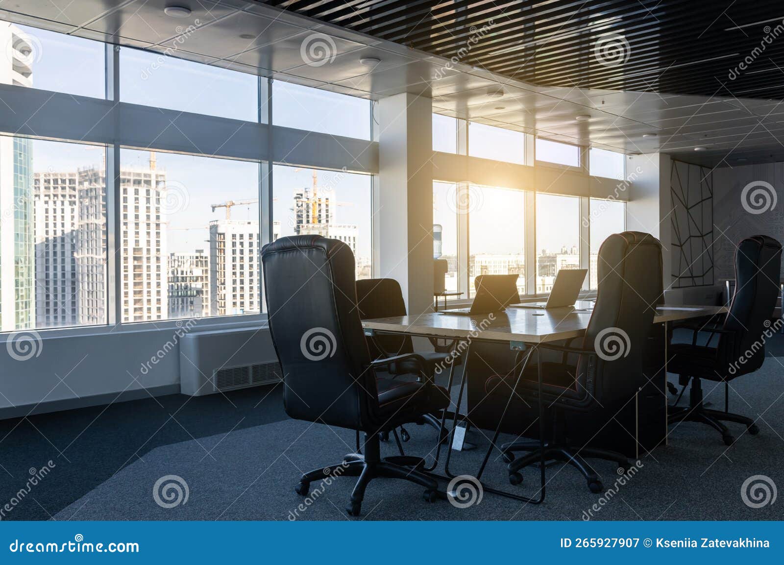 Table and Chairs in the Interior of a Modern Office with Large ...