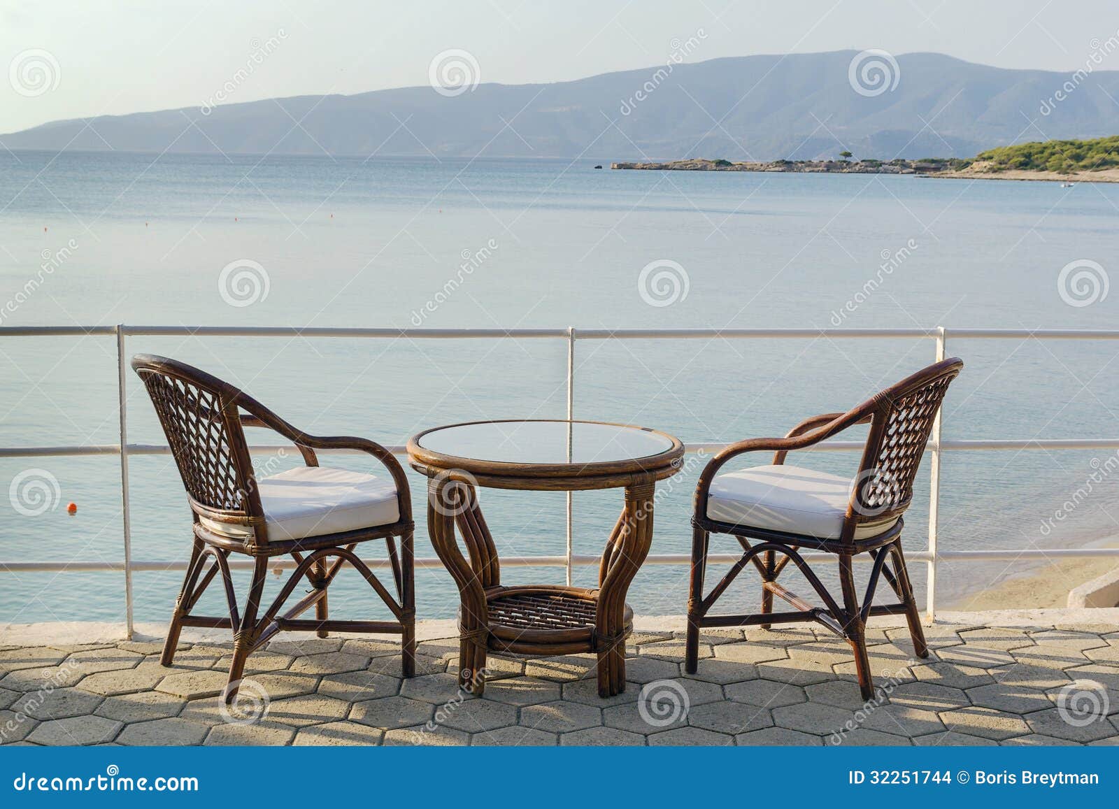Table and Chairs Overlooking the Sea Stock Photo - Image of chair ...