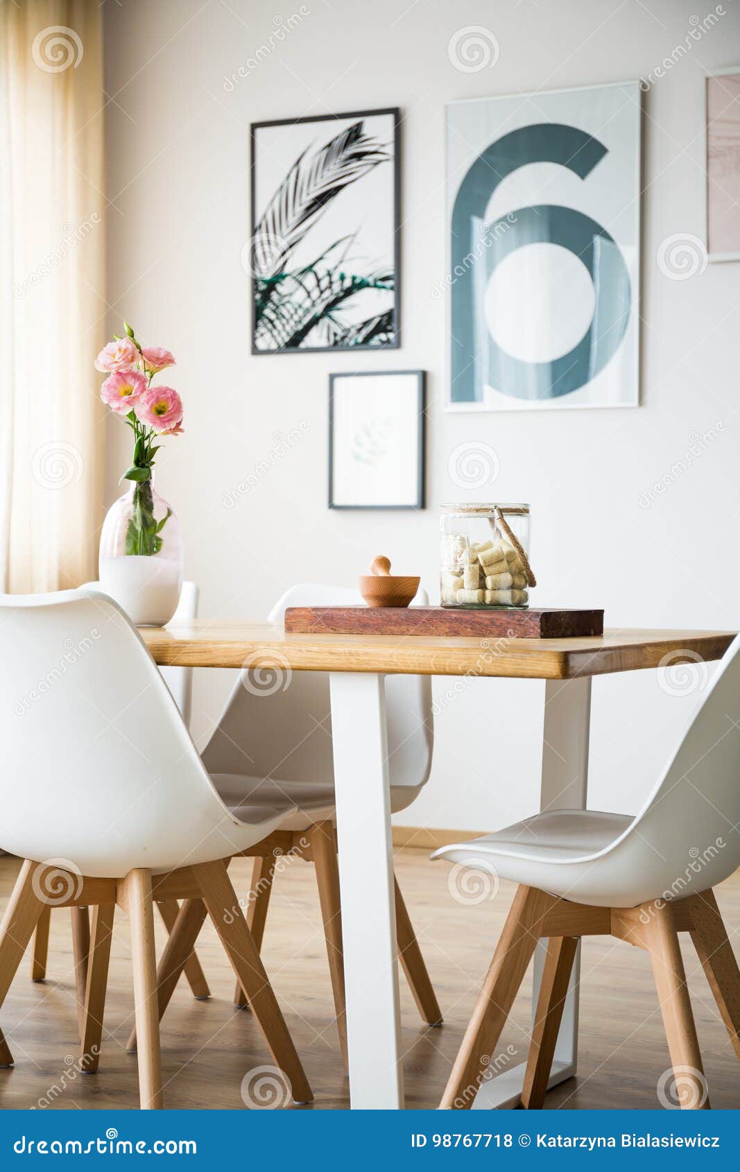 Table and chairs in a room stock photo. Image of monochromatic - 98767718