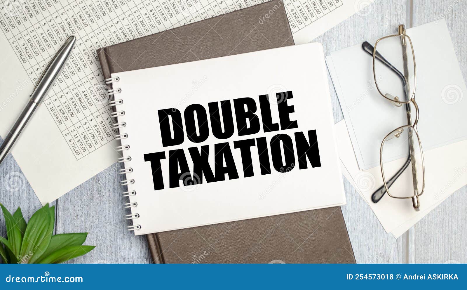 On the Table Charts, Calculator and Notebook with the Inscription ...