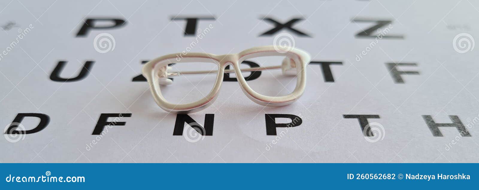 Table for Checking Visual Acuity and Emblem of Optics Closeup Stock ...