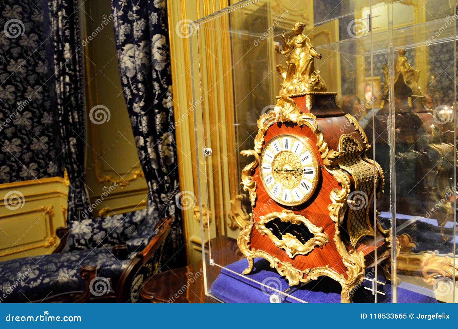 Old Table Clock With Golden Statue Of A Female Figure. Editorial Photo ...