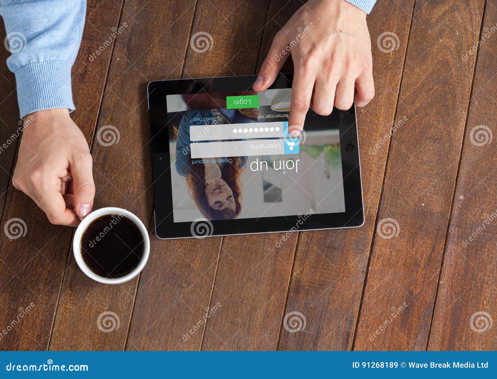 In the Table with the Coffe and the Tablet with Login Screen Stock ...