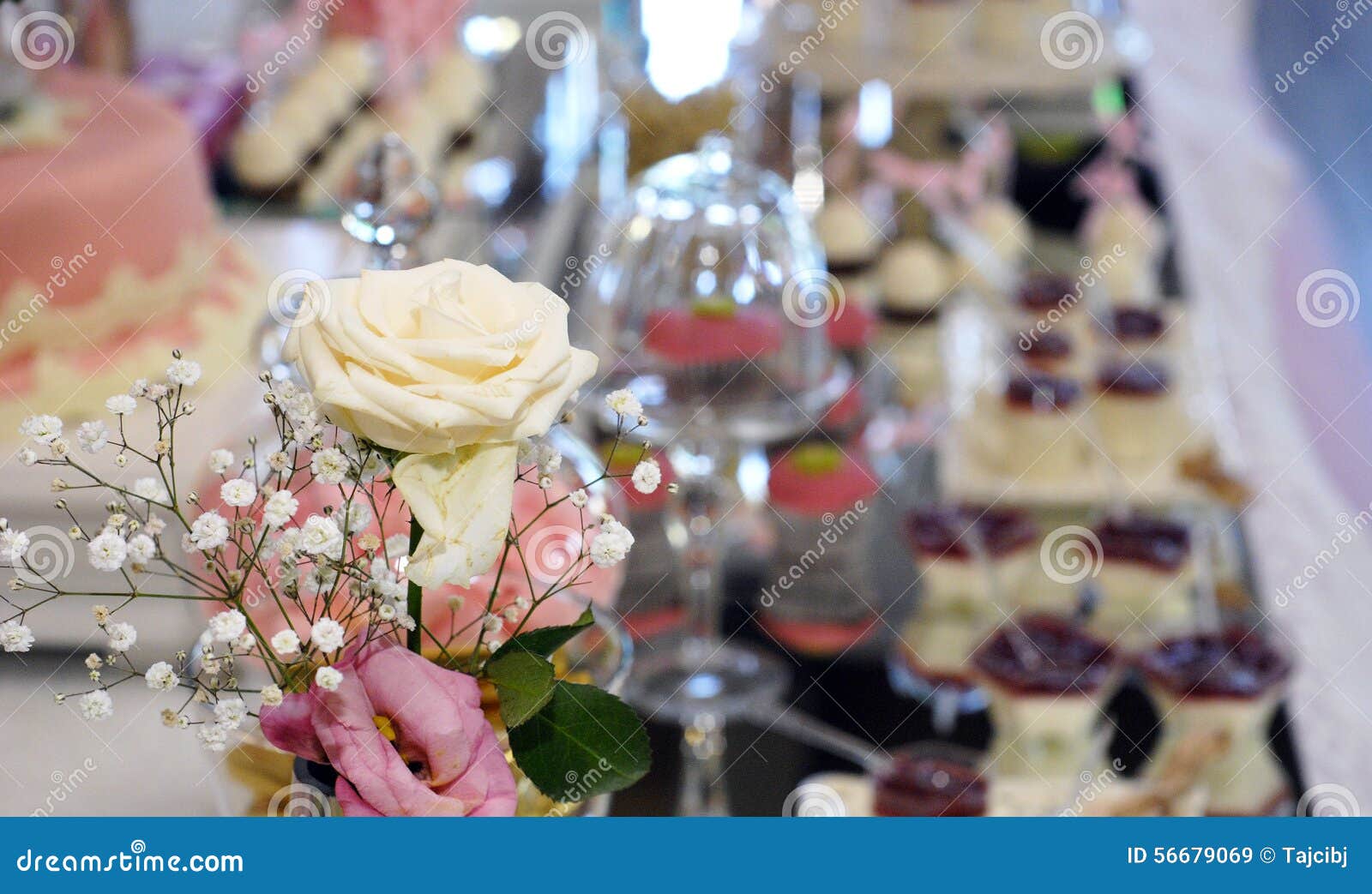 Table decorated with roses stock image. Image of cakes - 56679069
