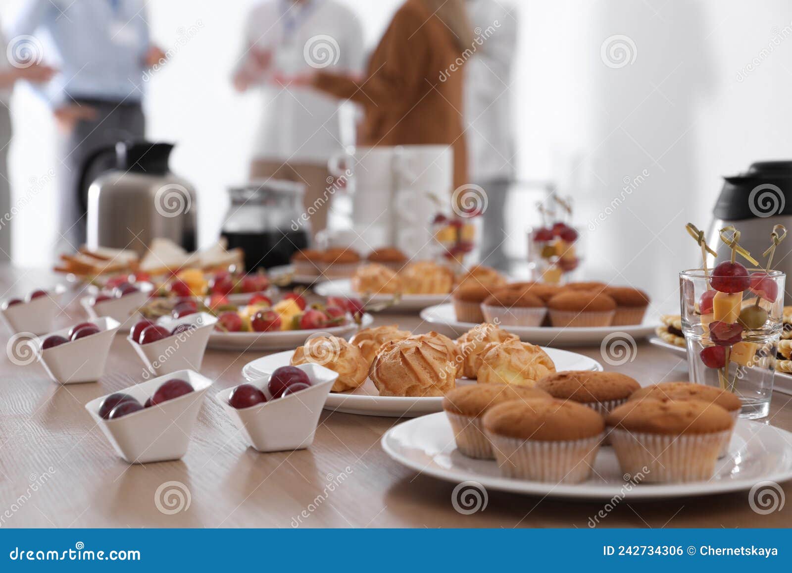 Table with Different Delicious Snacks Indoors. Coffee Break Stock Photo ...