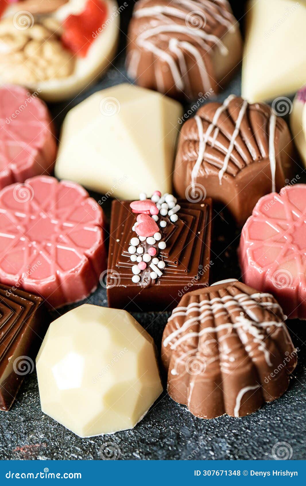Assorted Types of Chocolates Spread on a Table Stock Photo - Image of ...