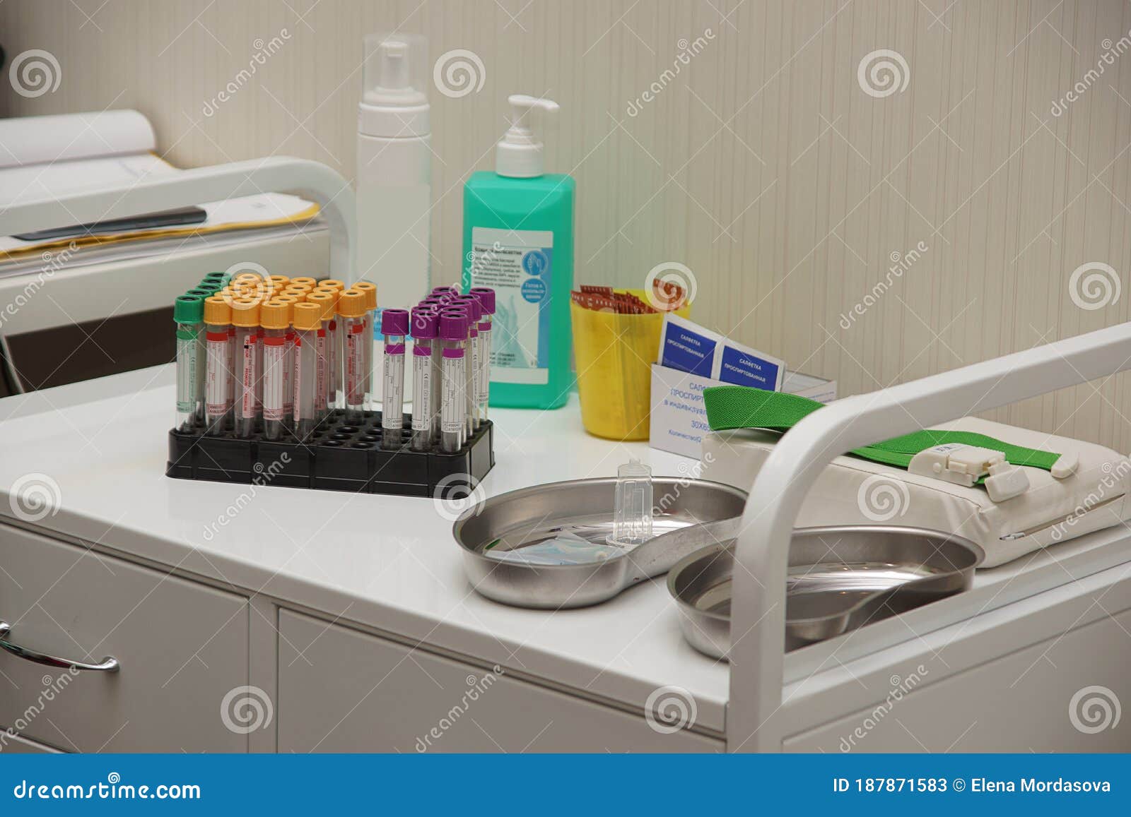 A Table in the Doctors Office with Many Disinfectants and a Set of Test ...