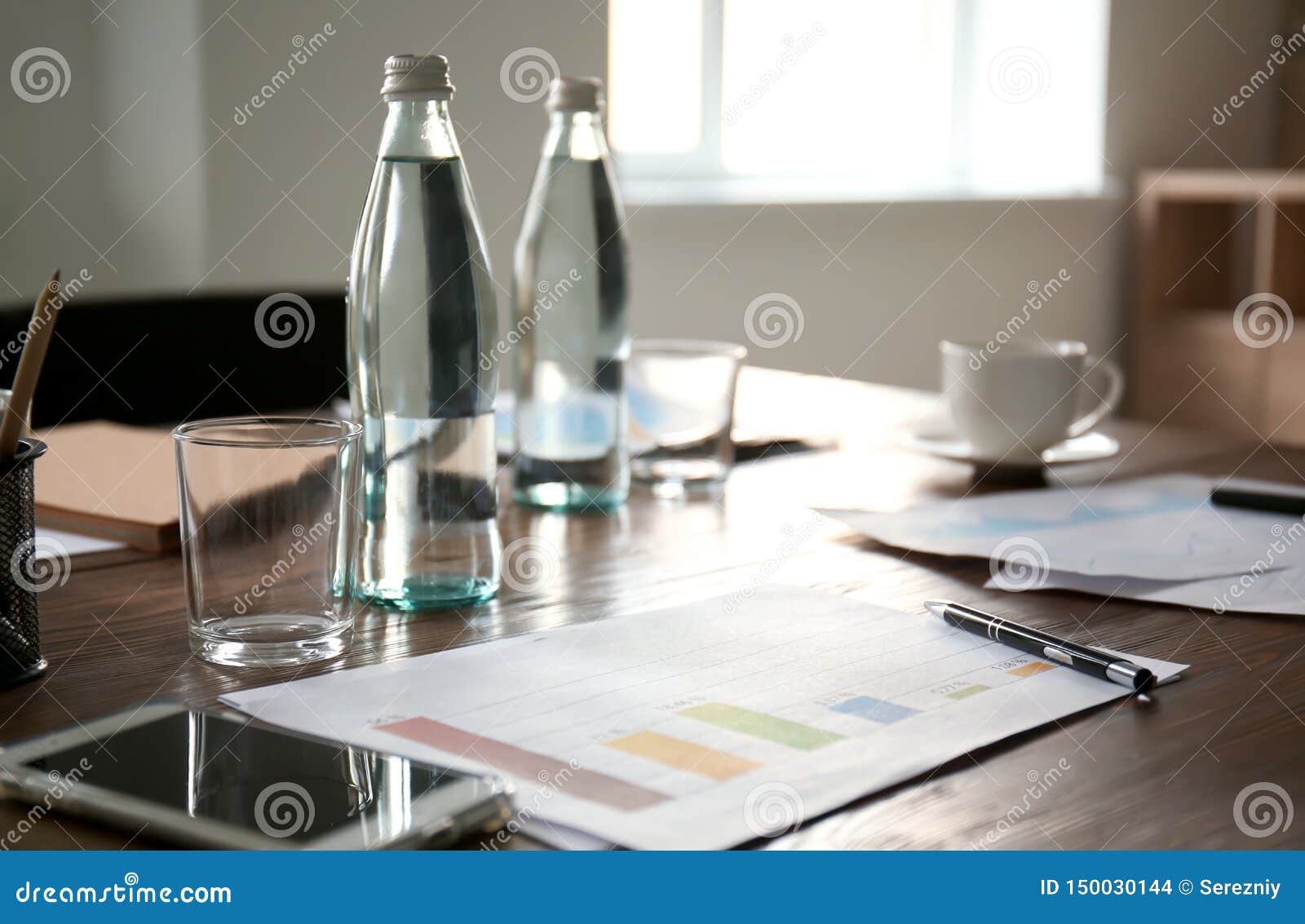 Table with Documents and Bottle of Water Prepared for Business Meeting ...