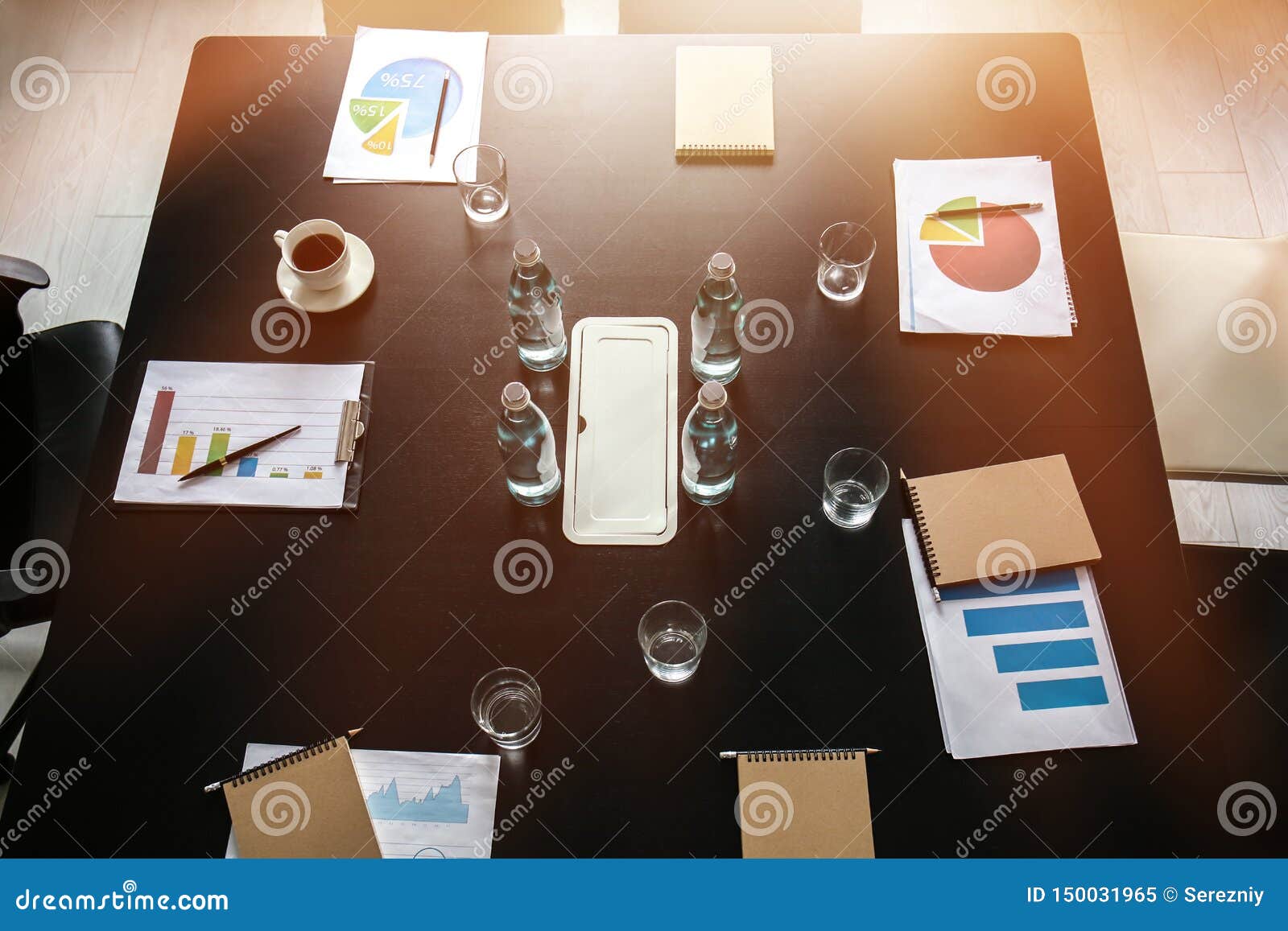 Table with Documents and Bottles of Water Prepared for Business Meeting ...