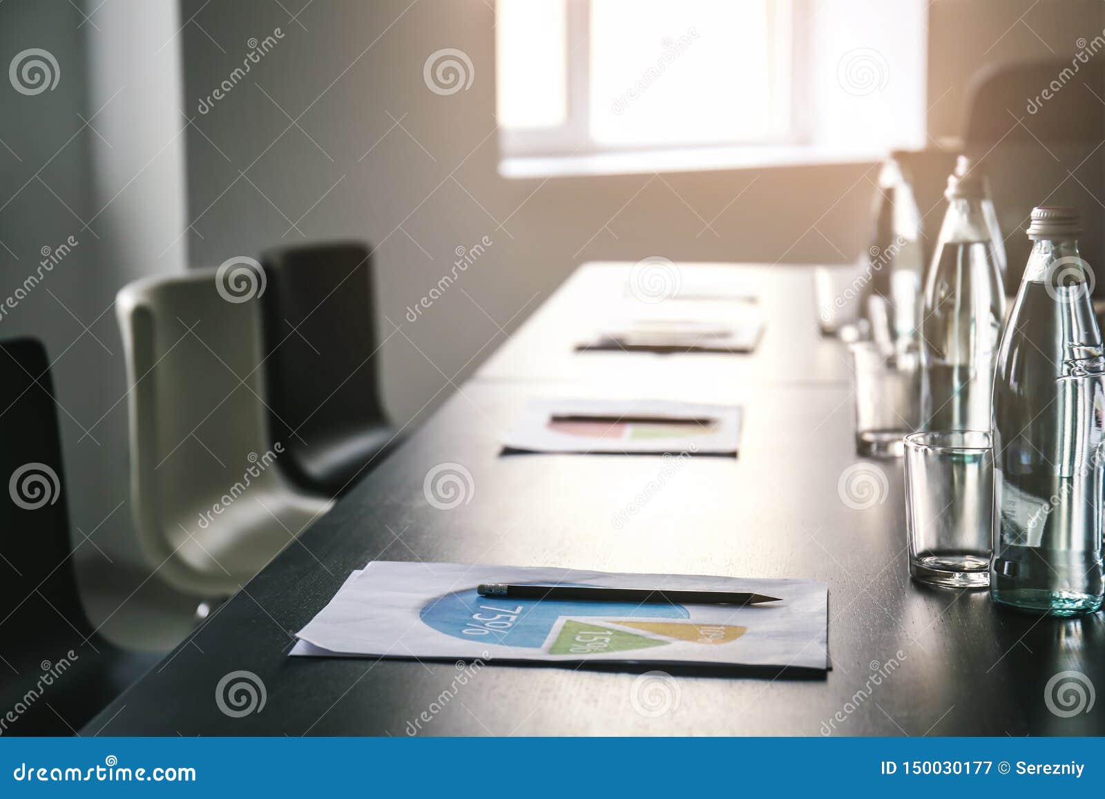 Table with Documents and Bottles of Water Prepared for Business Meeting ...