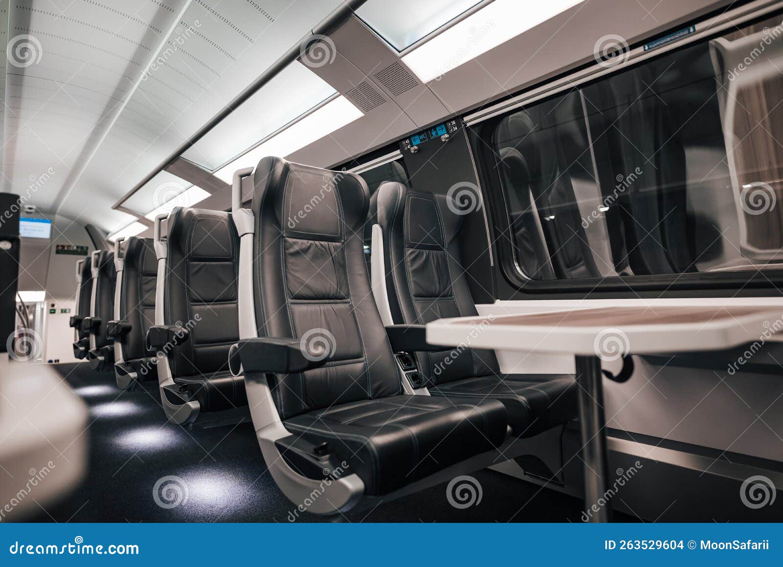 Table and Empty Comfortable Seats in Modern Passenger Train Stock Photo ...