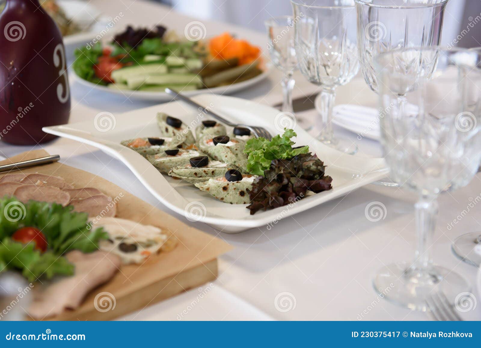 A Table with Food Dishes in the Restaurant. Stock Image - Image of fork ...