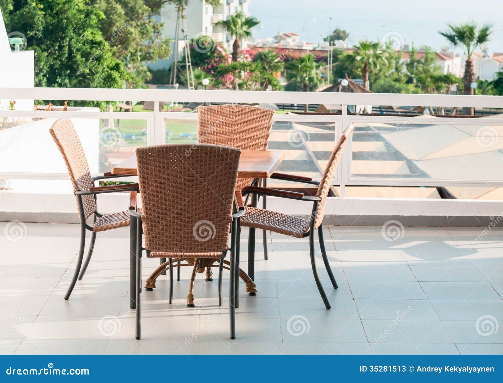 Table with Four Chairs Standing on Open Air Terrace Stock Image - Image ...