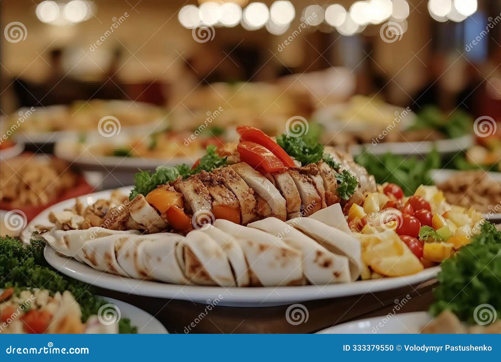 A Table Full of Different Types of Food on Plates Stock Photo - Image ...