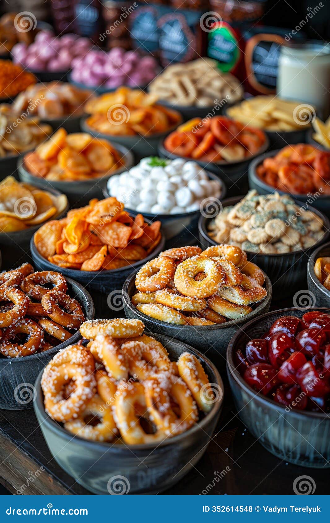 A Table Full of Different Types of Snacks and Treats Stock Photo ...