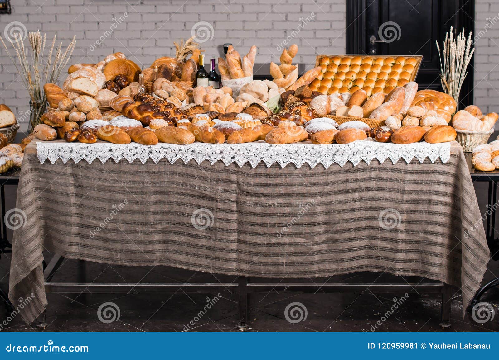 Table Full of Various Types of Fresh Bread. Wheat and Rye Breads Stock ...