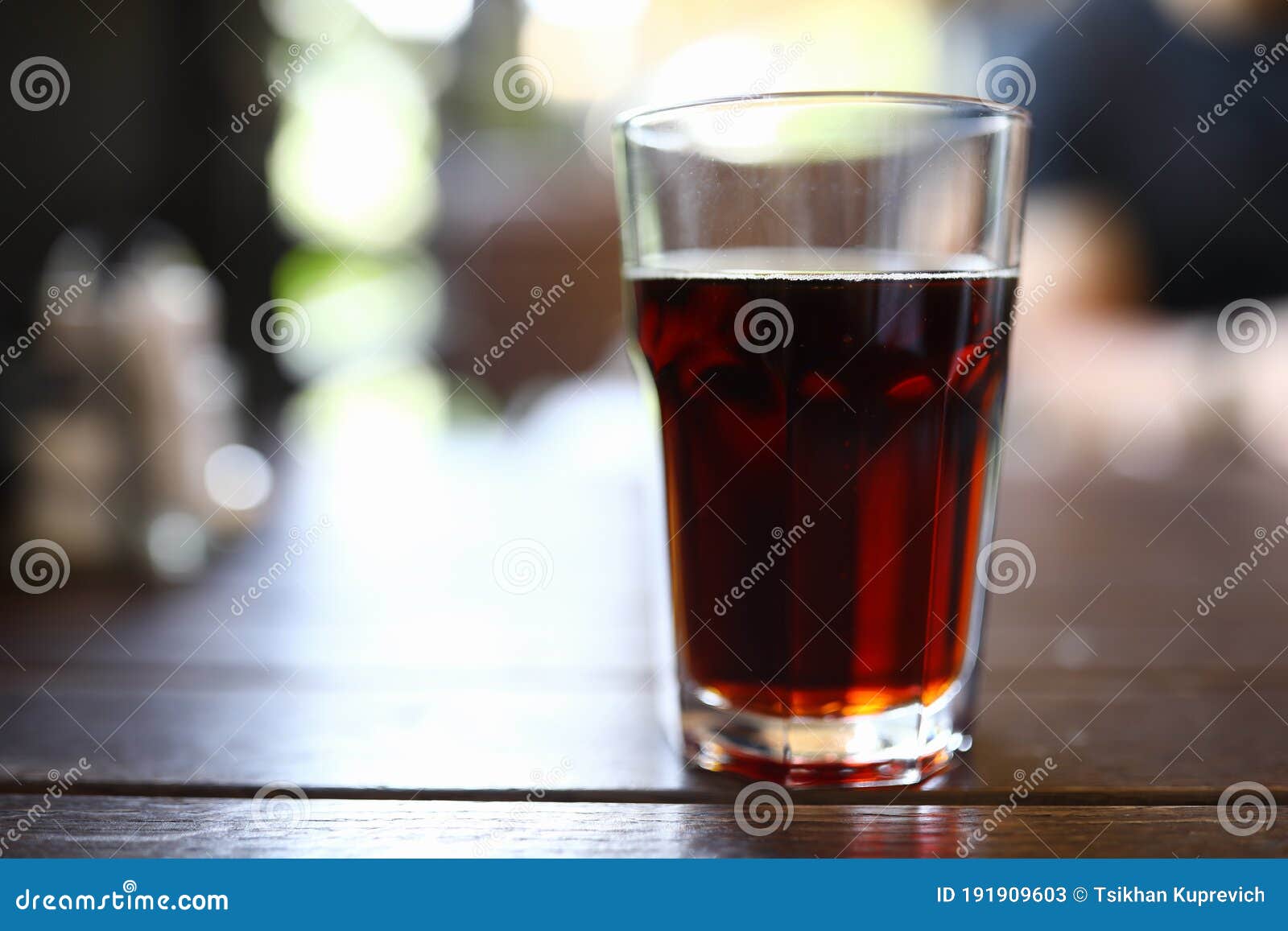 On Table is Glass of Tea Colored Liquid. Stock Image - Image of brown ...